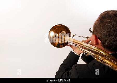 Tenor Trombone player in playing position Stock Photo - Alamy