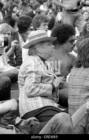 English jazz and blues singer George Melly sitting among the audience ...