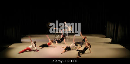 Dancers with Rubicon Dance company performing on stage with solo ...