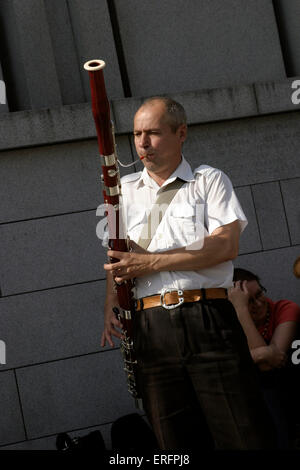 Street musician, bassoon player - in Prague Stock Photo - Alamy