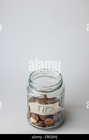 Jar for tips with euro cents coins Stock Photo - Alamy
