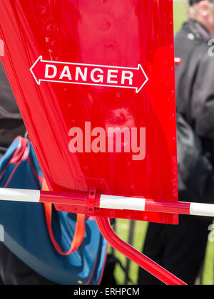 'Danger' warning sign near the tail rotor of a Robinson leisure ...