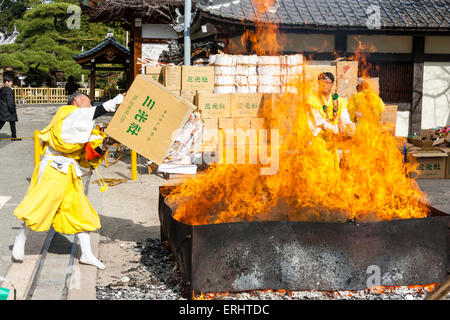 Japan, Nishinomiya, Mondo Yakujin Temple. Yamabushi priest in yellow ...