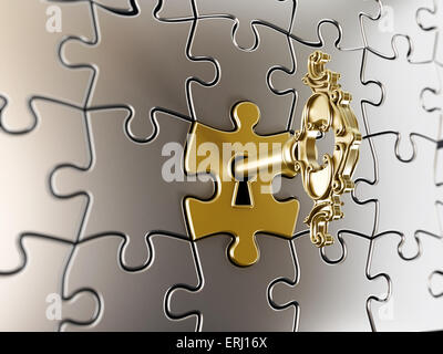 Golden key on the puzzle part Stock Photo - Alamy