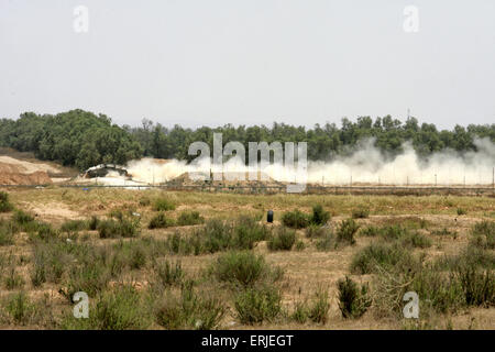 An Israeli soldier work on a tank near the border with Lebanon in ...