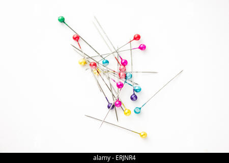 Colorful stack of sewing needles in white background Stock Photo - Alamy