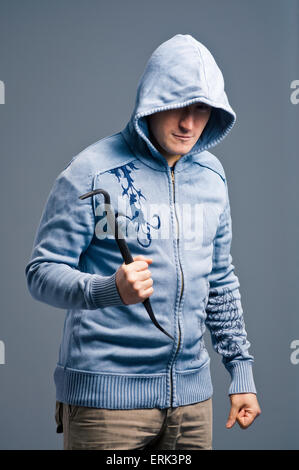 The aggressive bandit with a crowbar Stock Photo - Alamy