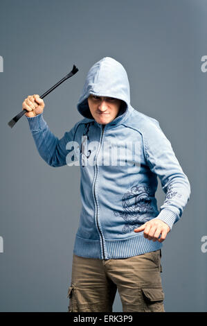 The aggressive bandit with a crowbar Stock Photo - Alamy