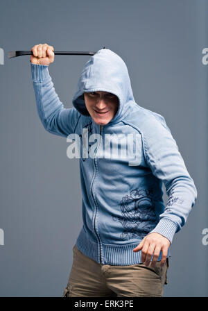 The aggressive bandit with a crowbar Stock Photo - Alamy