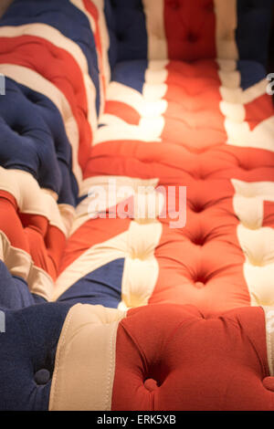 Sofa with a patriotic Union Jack pattern on it. Isolated on white ...