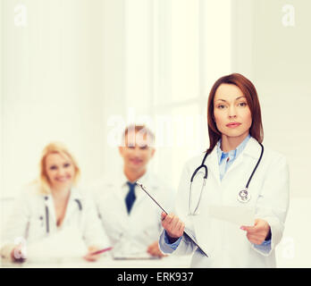 female doc prescribing pills Stock Photo - Alamy