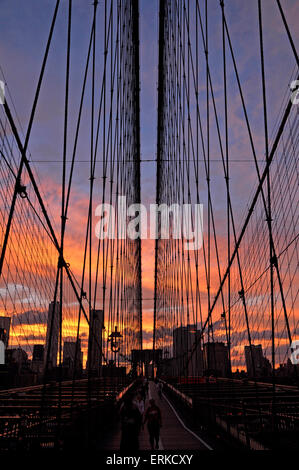 Sunset afterglow of the Brooklyn Bridge and New York City skyline at ...