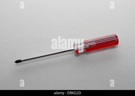 Flat screw driver with red handle, hand tool screwdriver, isolated on ...