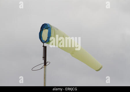 Windsock, a conical textile tube designed to indicate wind direction ...