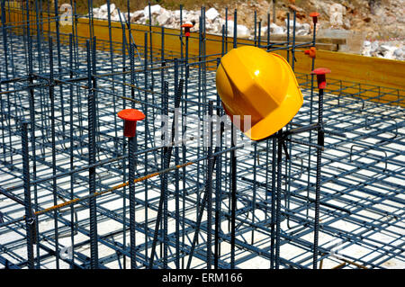 Protective plastic caps on steel reinforcing bars on a UK constriction ...