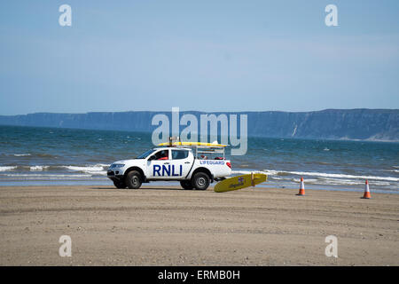 Rnli Patrol on beach at filey North Yorkshire Stock Photo - Alamy