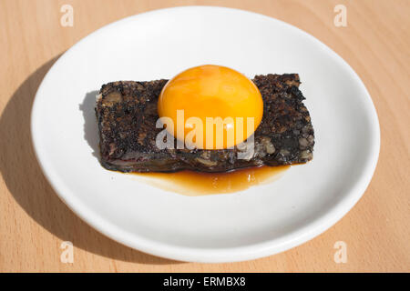 Pig blood cake with egg yolk on top, BAO London, Taiwanese restaurant ...