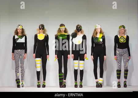Models on the runway during the Ravensbourne fashion show at Graduate ...