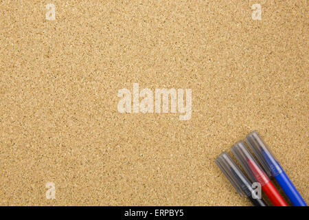 three color marker on cork board Stock Photo - Alamy
