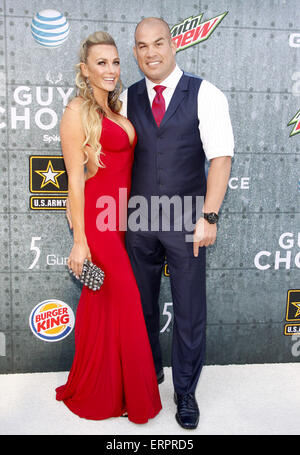 Amber Nichole Miller (L) and MMA fighter Tito Ortiz arrived on T-Mobile ...