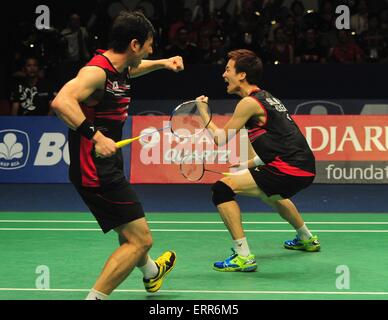 Ko Sung-hyun and Shin Baek-cheol of South Korea compete against Kim Gi ...