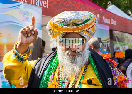 Sikh Punjabi man Kala Kala in colourful Dastar turban and vibrant ...