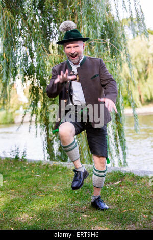 A traditional bavarian man in the autumn nature Stock Photo - Alamy