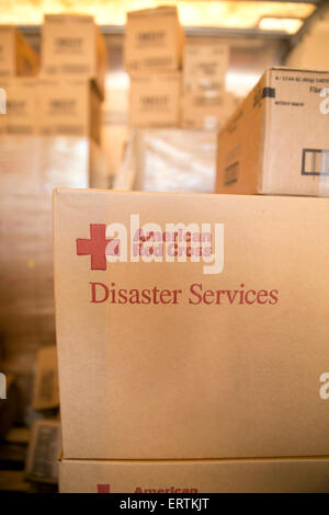cardboard boxes with disaster supplies donated by the American Red ...