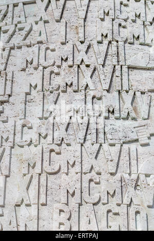 A background of Roman numerals and letters set in stone Stock Photo - Alamy