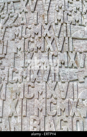 A background of Roman numerals and letters set in stone Stock Photo - Alamy