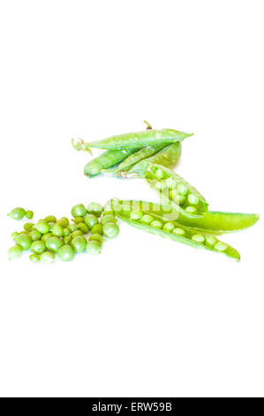 Frame of green pea pods and peas on the kitchen background Stock Photo ...