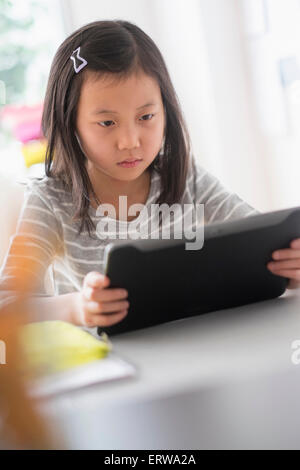 Chinese student thinking about homework Stock Photo - Alamy