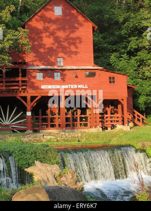 An old red grist mill with water wheel and dam Stock Photo - Alamy
