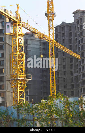 Massive building construction in city Stock Photo - Alamy