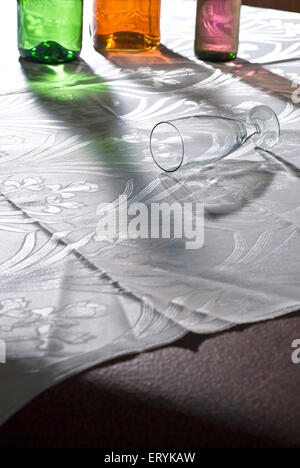 White wine in glass and bottle on room background Stock Photo - Alamy