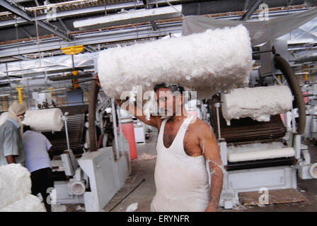 Mill workers working in textile mill ; Bombay now Mumbai Stock Photo ...