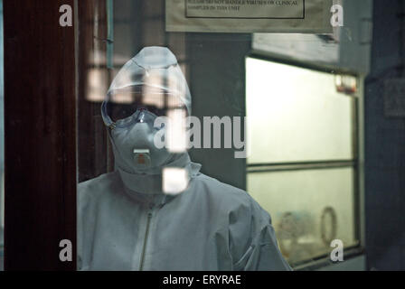Scientist in protective gear in haffkine institute ; Bombay Mumbai ...