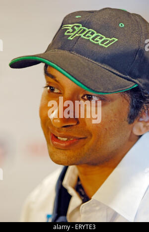 Indian Formula One driver Narain Karthikeyan takes questions from the ...