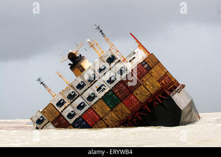 Container ship sinking tilted dangerously after colliding accident in ...