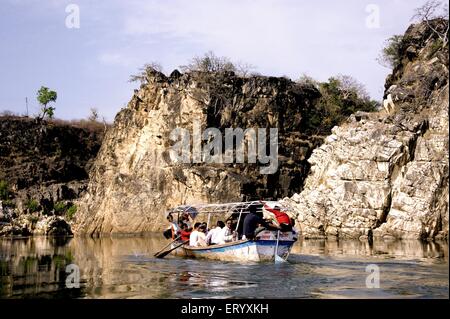 Tourist boat in the Marble Rocks Gorge, on the Narmada River, Bhedaghat ...