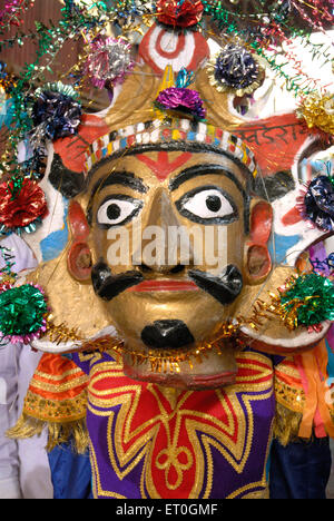 The Asian statues with a mask Stock Photo - Alamy