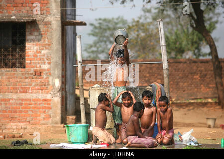 Indian rural happy villager friends standing together on a white ...
