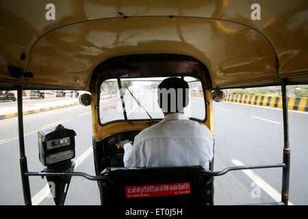 Driver in auto rickshaw on streets of Chandigarh, UT, India, Asia Stock ...