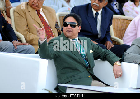 Former King Gyanendra Shah of Nepal waves upon his arrival at Tribhuvan ...