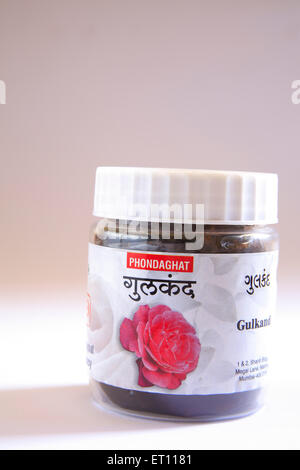 gulkand in plastic bottle on white background Stock Photo - Alamy