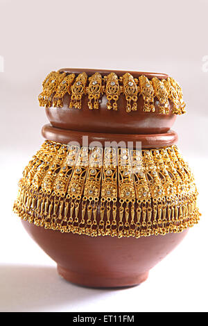 Gold Necklace ; Gulband an ornament for neck around clay pot ; India ...