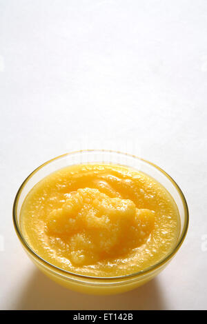 Ghee - pure granular homemade golden yellow ghee in glass bowl on Stock ...