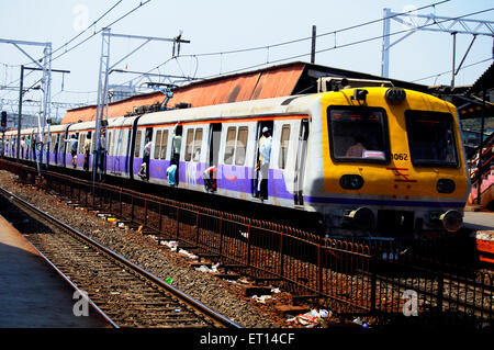A local Western Railway commuter train halted at Dadar Station, Mumbai ...