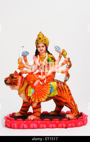 goddess durga on tiger, statue with white background Stock Photo ...