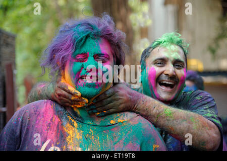 Woman celebrating holi festival Stock Photo - Alamy